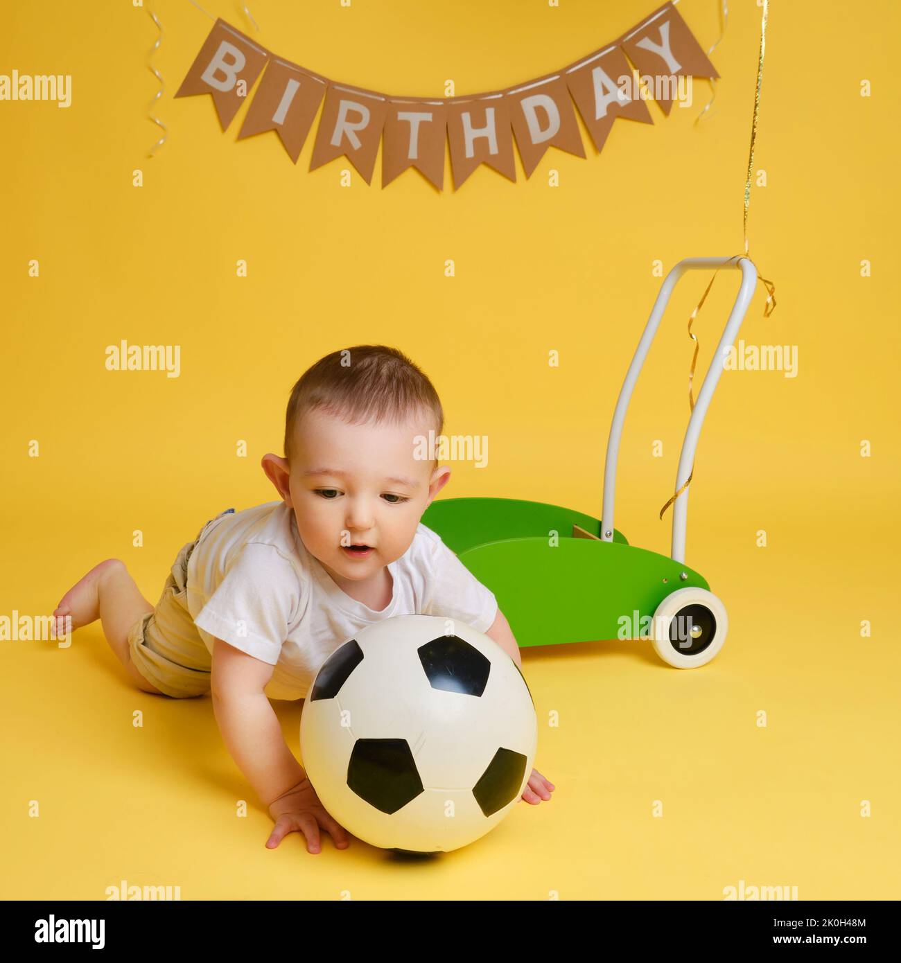 Decorations on a studio yellow background for celebrating the first ...