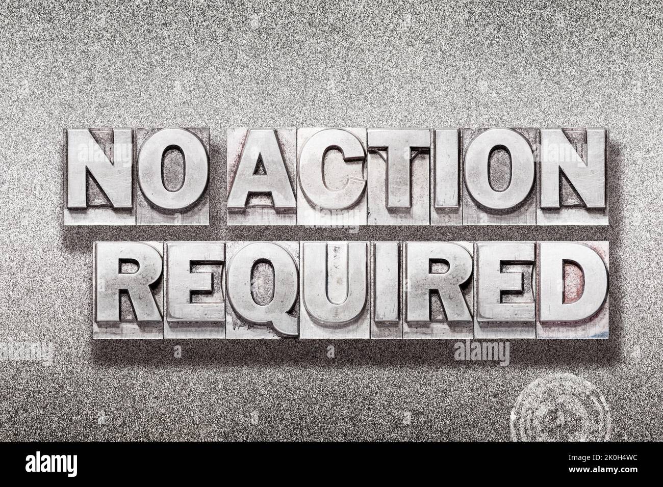 no action required phrase made from vintage letterpress on metallic ...