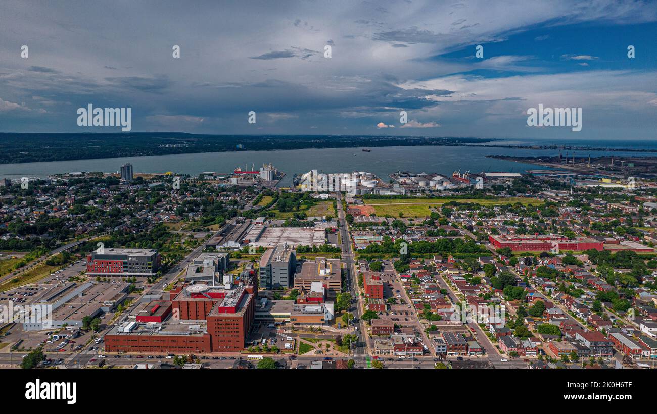 An aerial drone shot of the cityscape on a cloudy day Stock Photo - Alamy