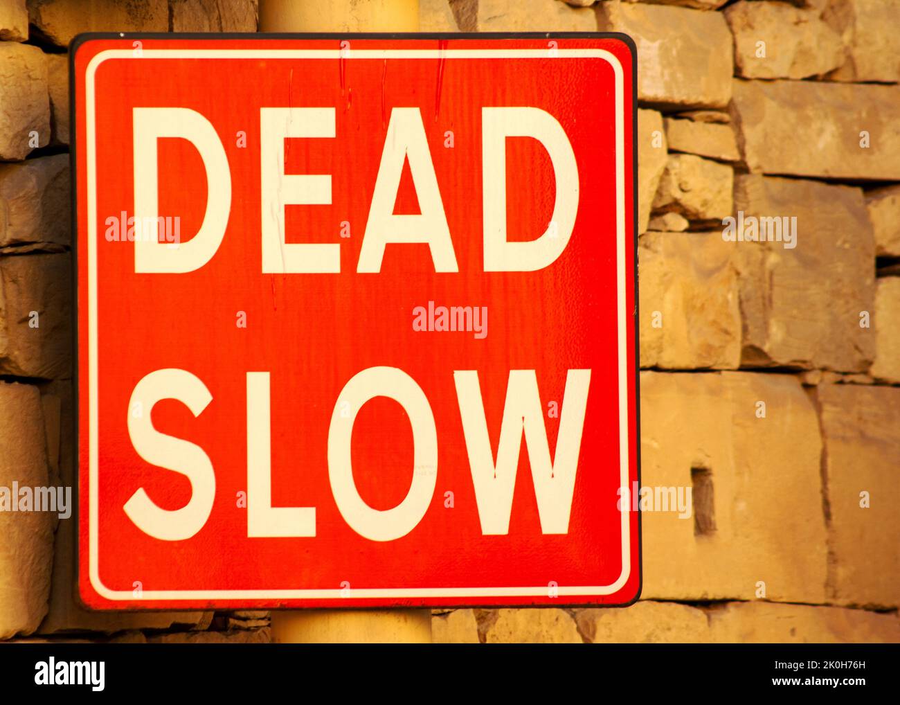 Dead slow road sign hi-res stock photography and images - Alamy