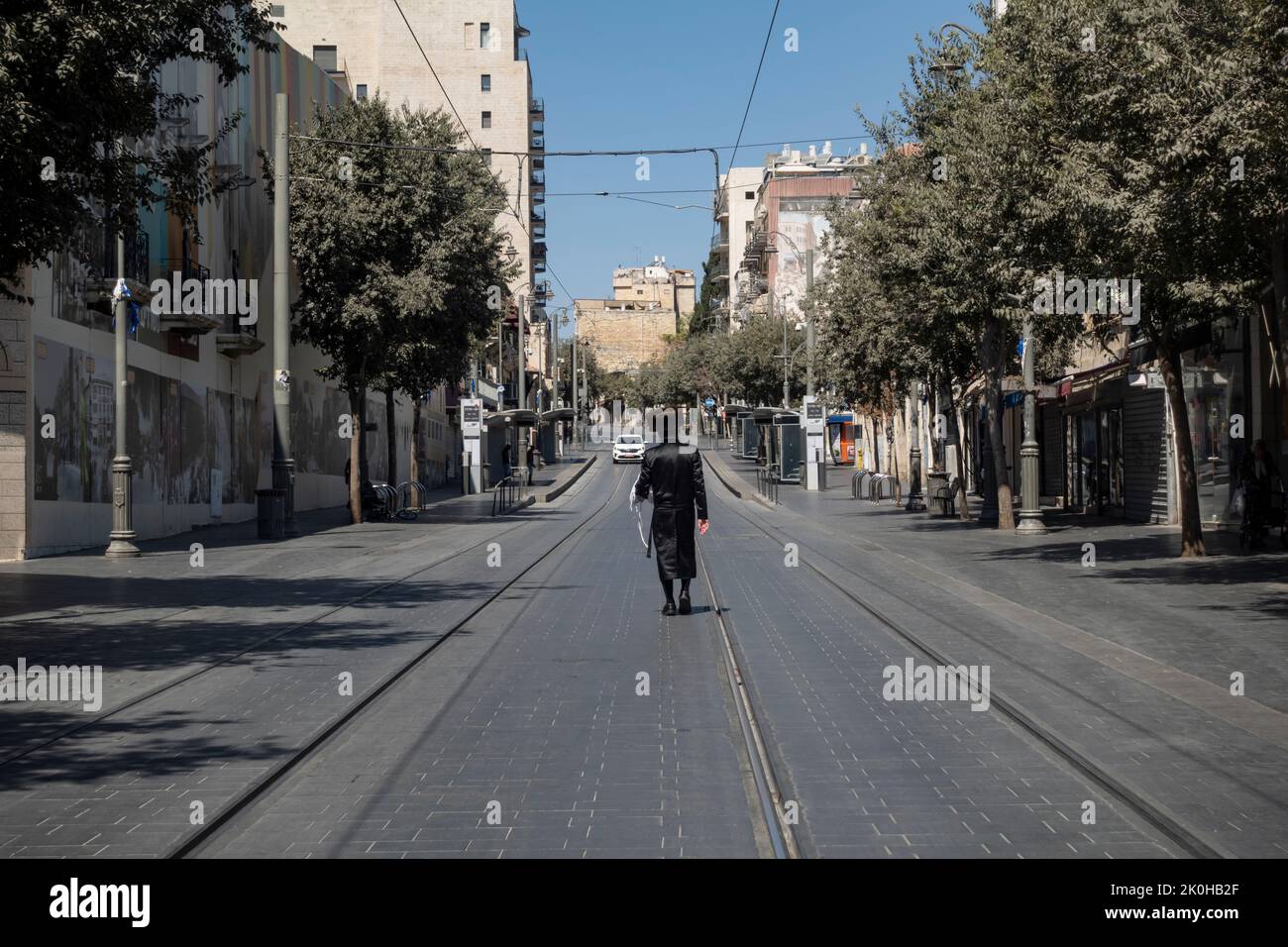 An orthodox Haredi Jew walks along empty Jaffa road on Saturday or ...
