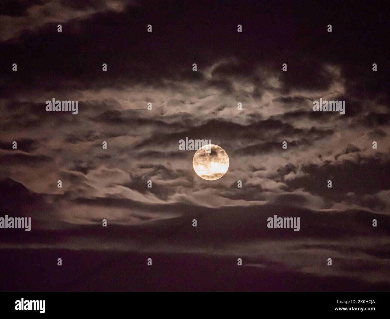full moon in the sky with clouds landscape Stock Photo - Alamy