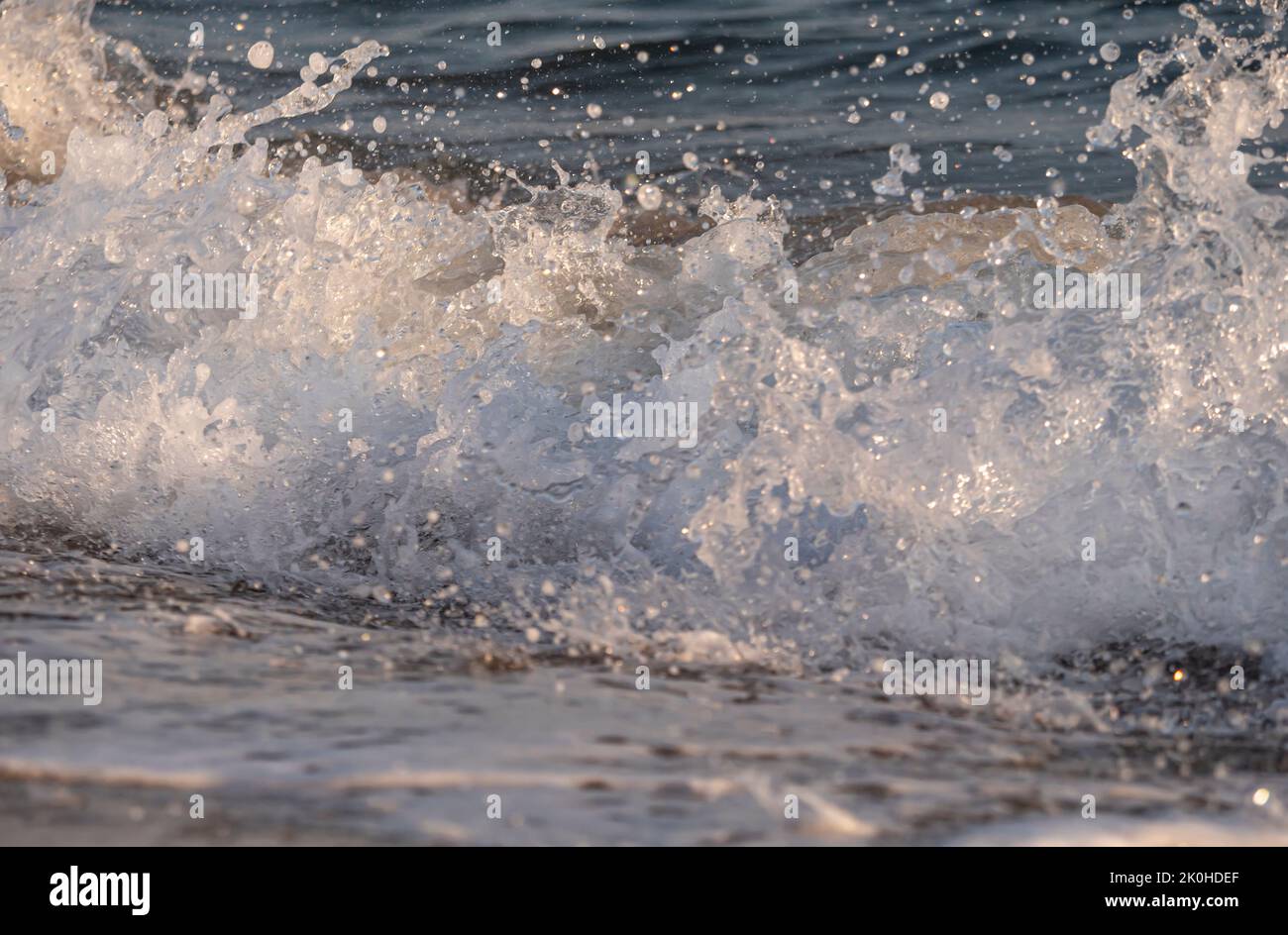 wave splash sea beach macro, close up Stock Photo - Alamy