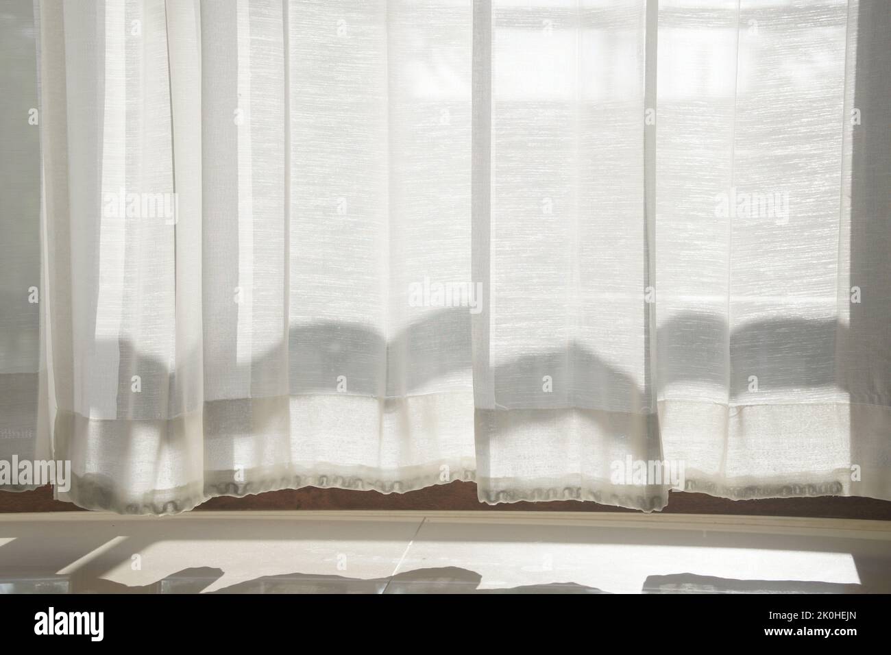 white transparent fabric see through sheer window curtain at home Stock ...