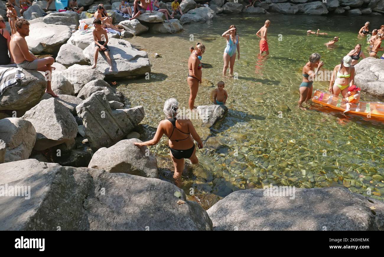 OSOGNA, SWITZERLAND - AUGUST 10, 2022: people enjoy the natural pool at ...