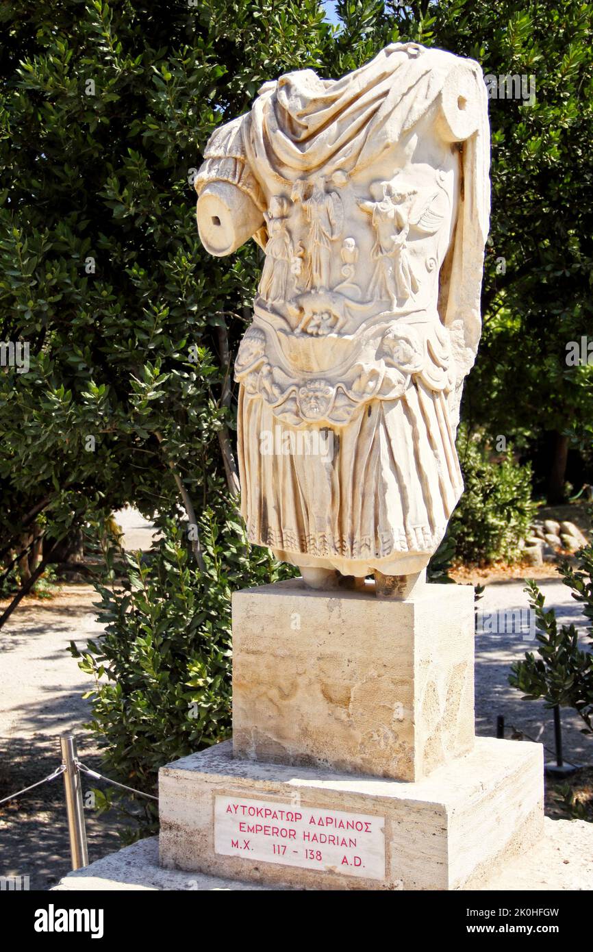 A vertical shot of a headless statue in the Palace of the Giants ...