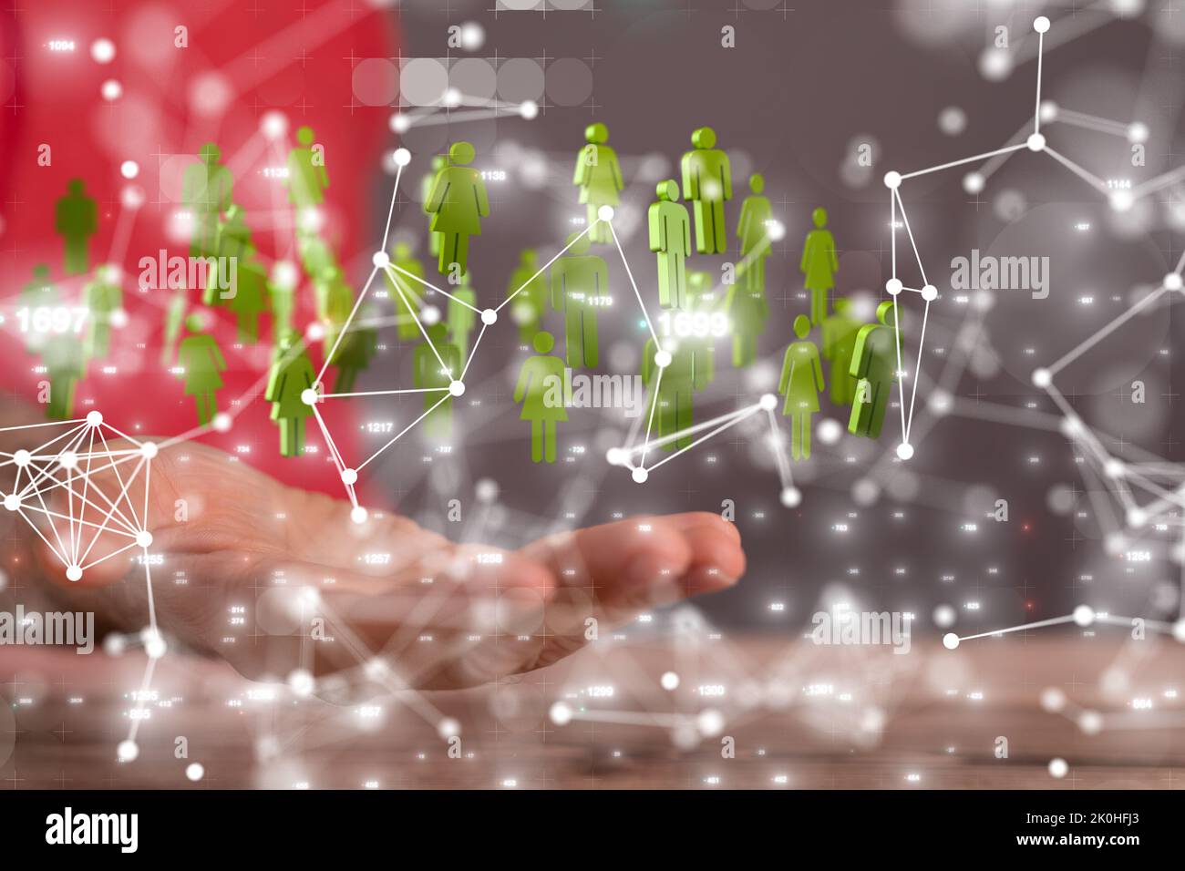 A group of 3D rendered people icons hovering over a man's hand Stock ...