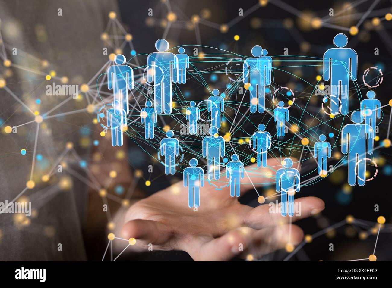 A group of 3D rendered people icons hovering over a man's hand Stock ...