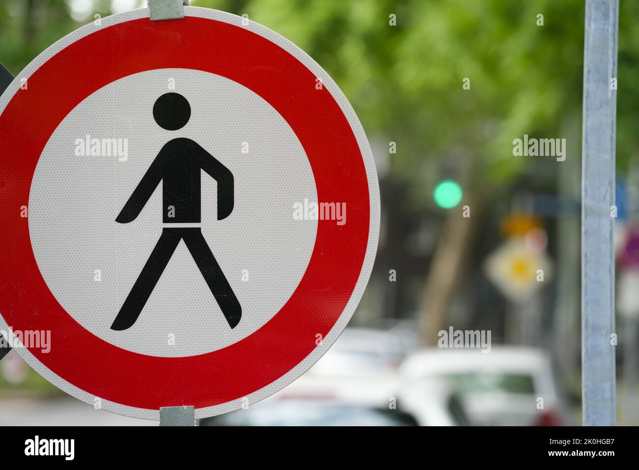 A closeup shot of a prohibition road sign -pedestrian movement is ...
