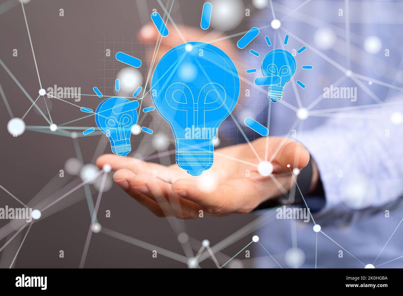 The hand presenting light bulbs - creative ideas or solutions concept ...