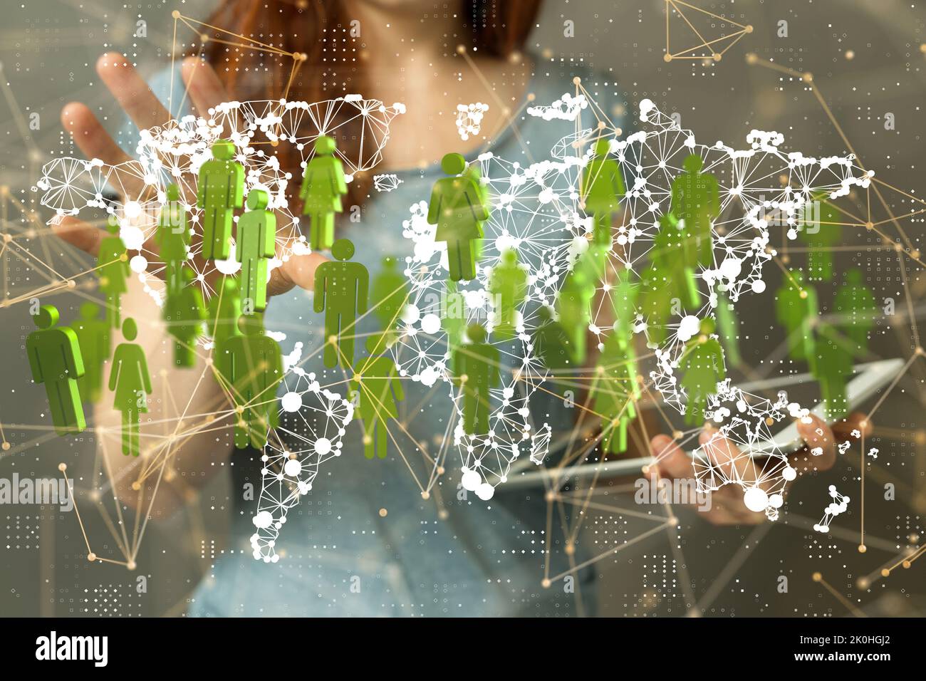 A group of illustrated people icons floating above hands Stock Photo ...