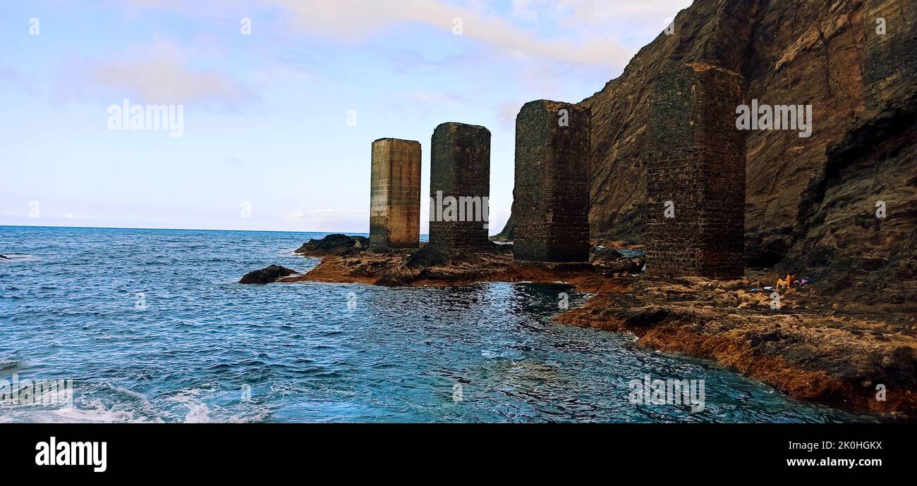 Magical seascape view with volcanic walls of natural pool in town of ...
