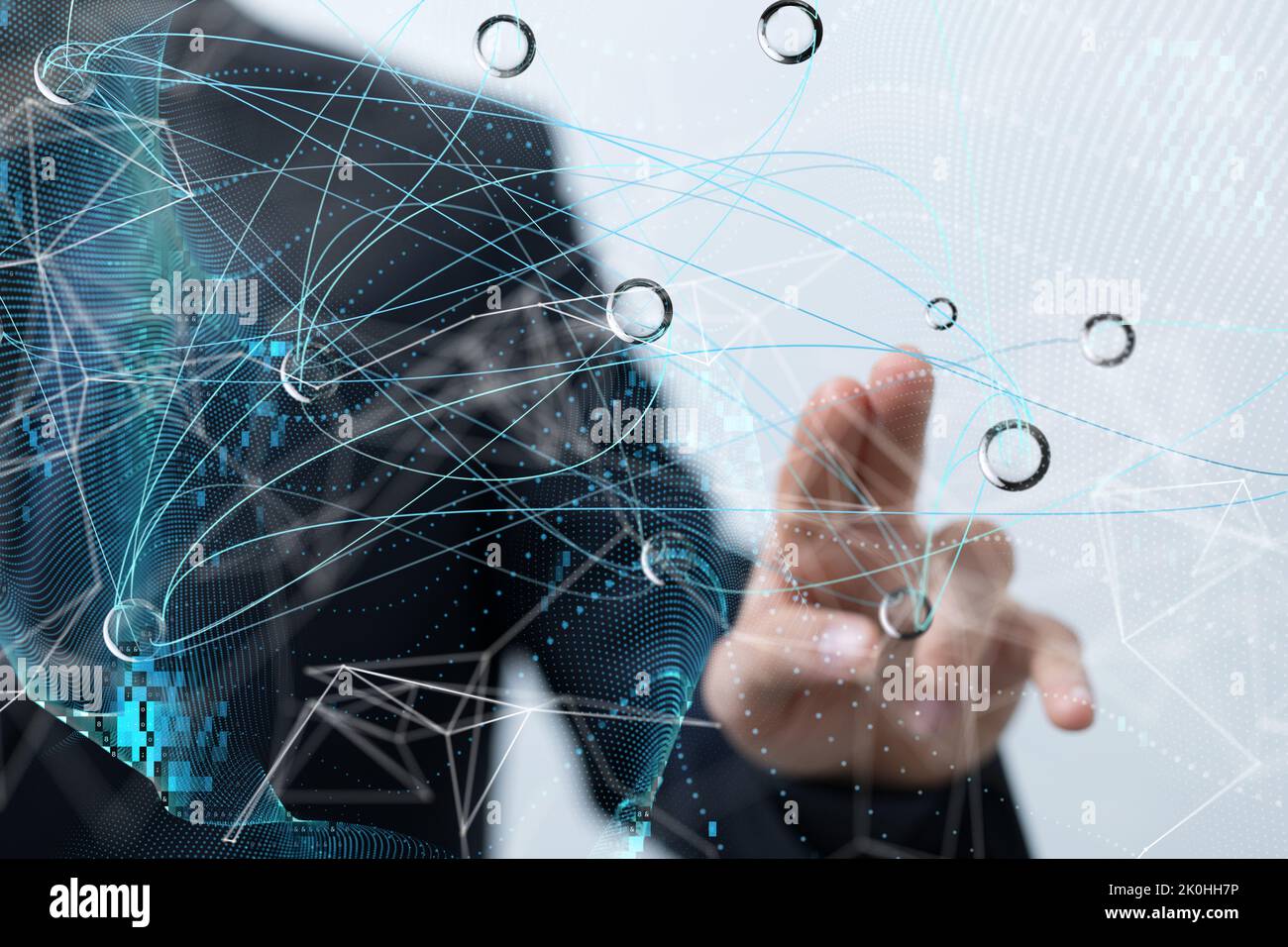 A closeup of the hand pointing at floating linked circles. Concept of ...