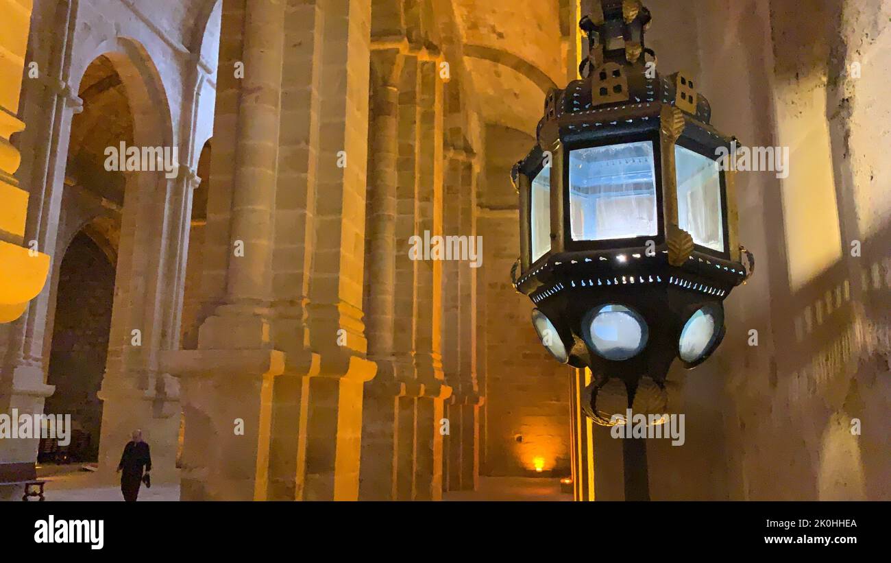 A closeup of a decorative glass lantern in a stone building Stock Photo ...