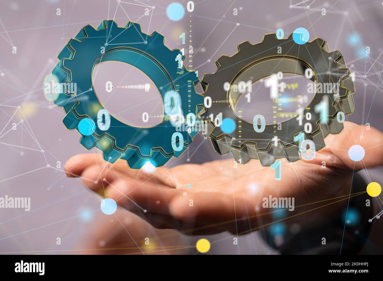 The two 3d gears with binary numbers hovering above the person's hand ...