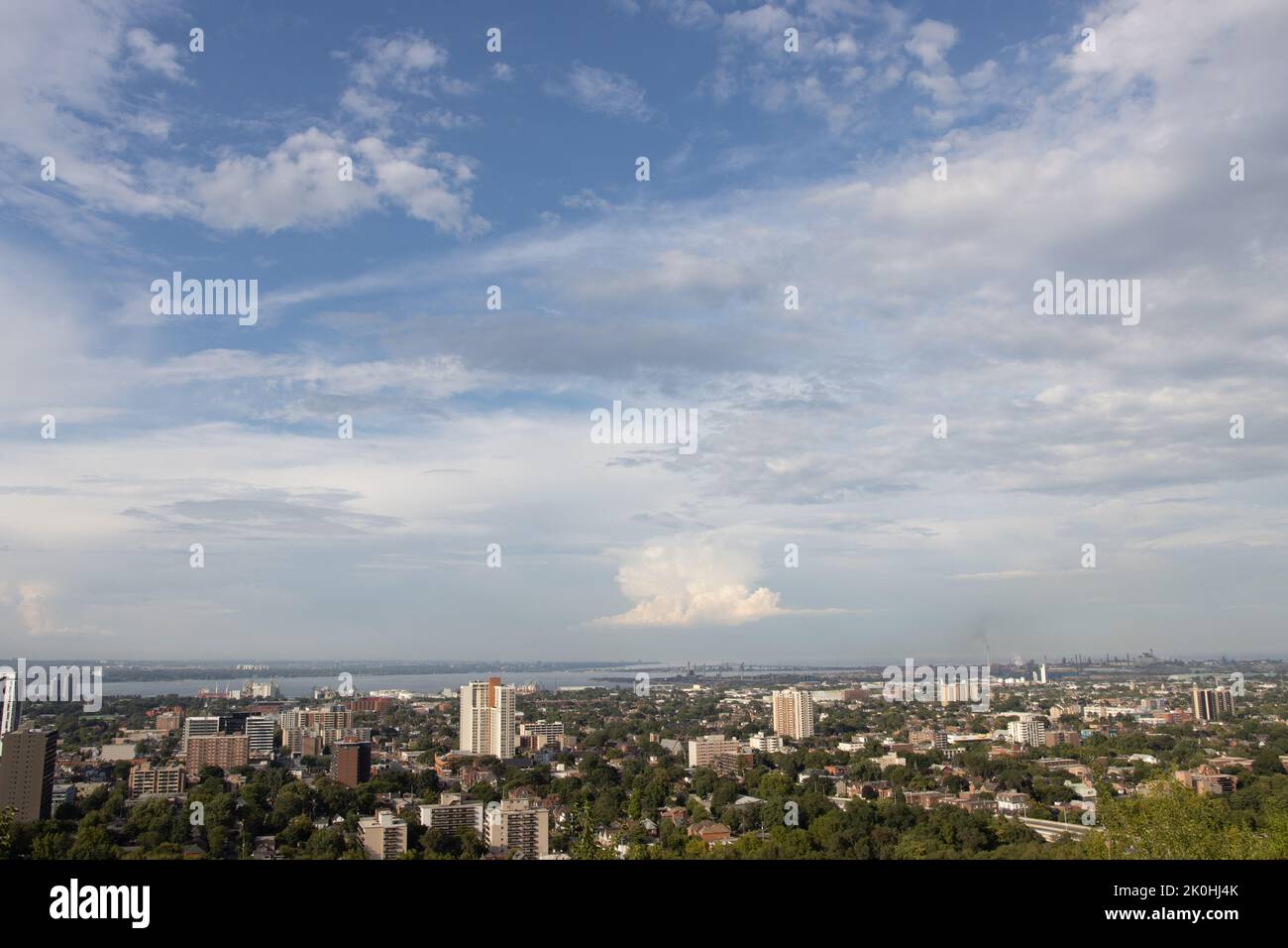 The tall buildings and beautiful vegetation of Hamilton, Ontario under ...
