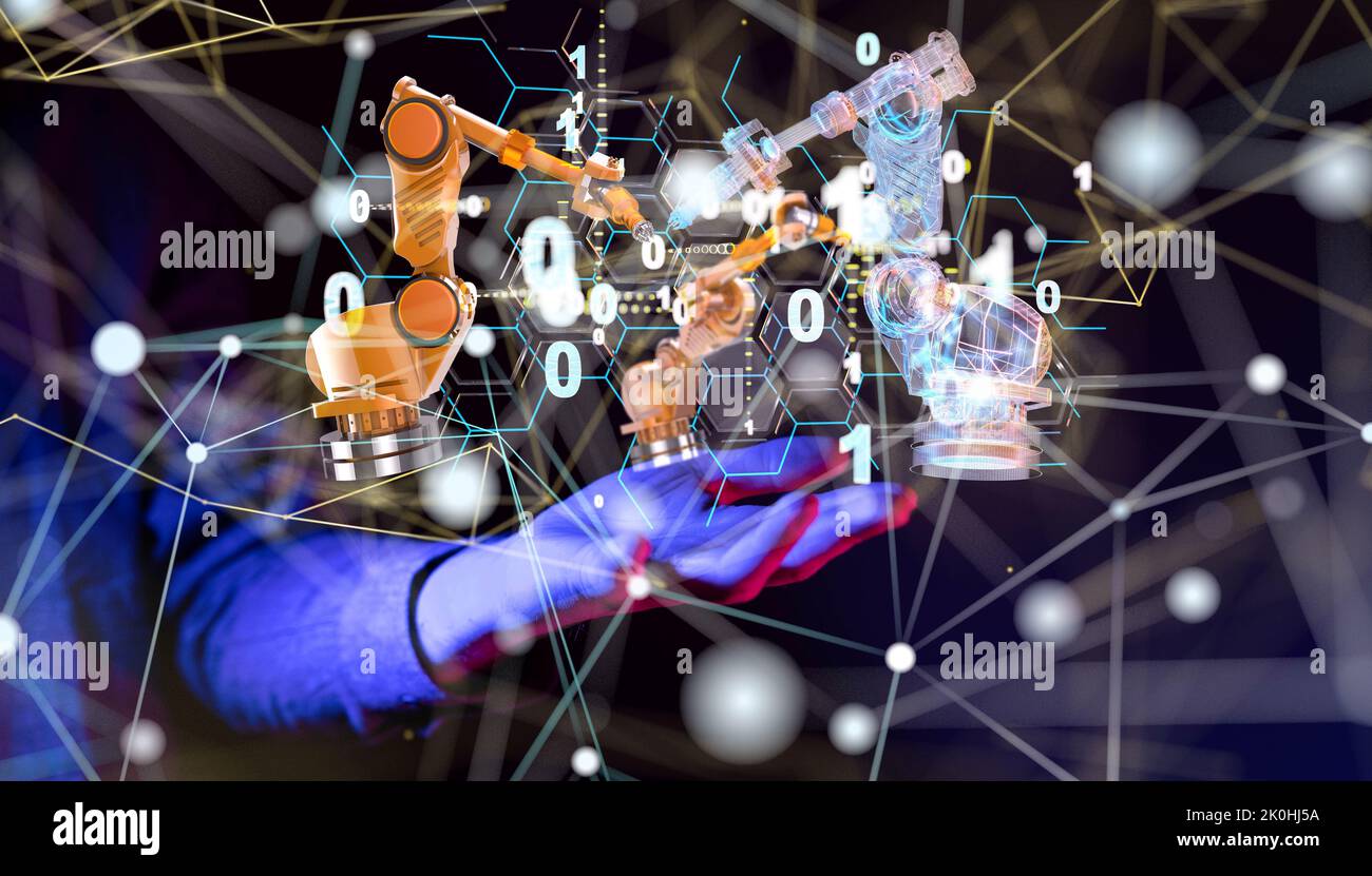 A man demonstrating models of robotic arms in a digital network of ...