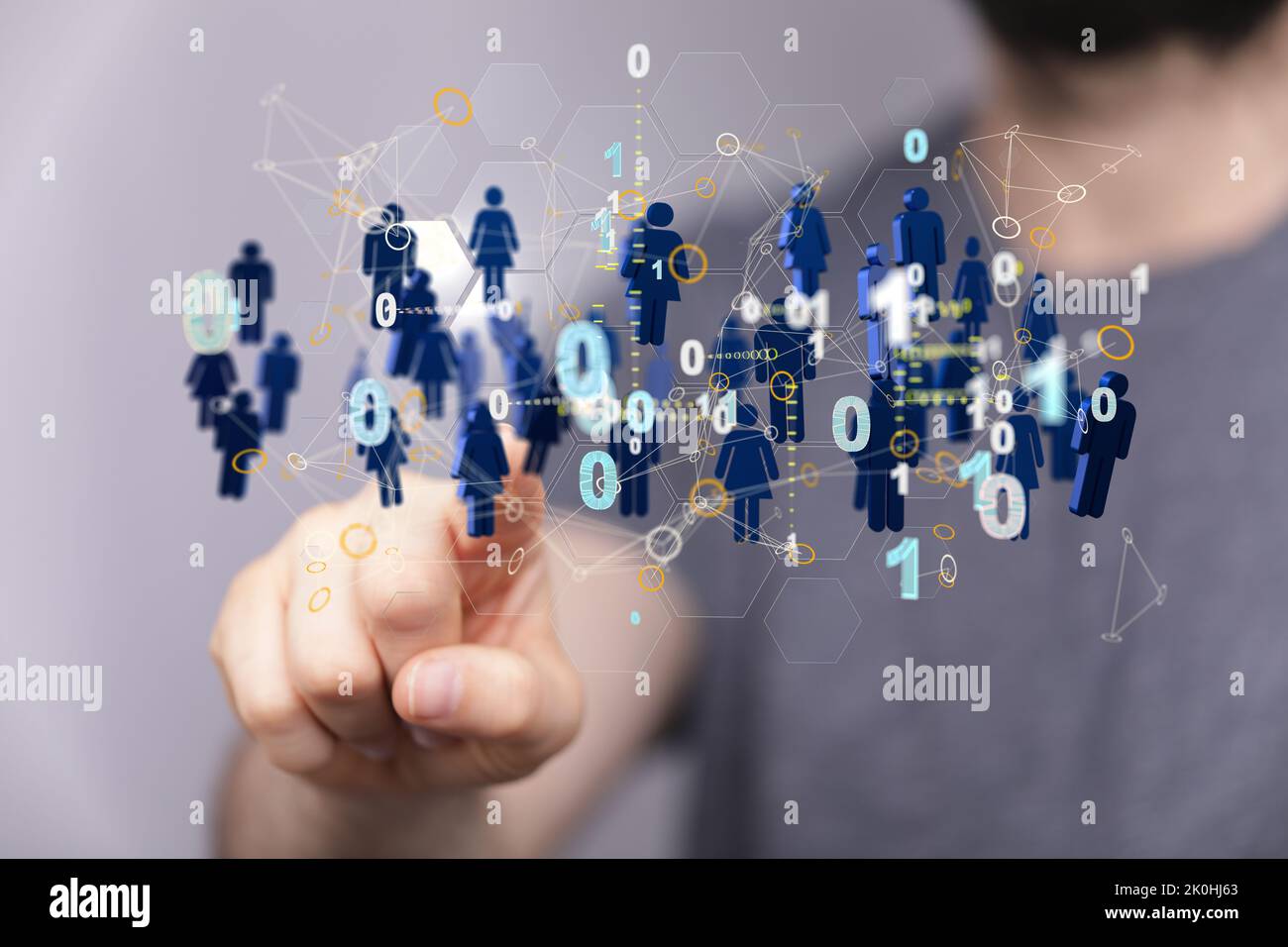 A finger pointing on 3d floating people icons and binary code- a concept of networking, HR ...