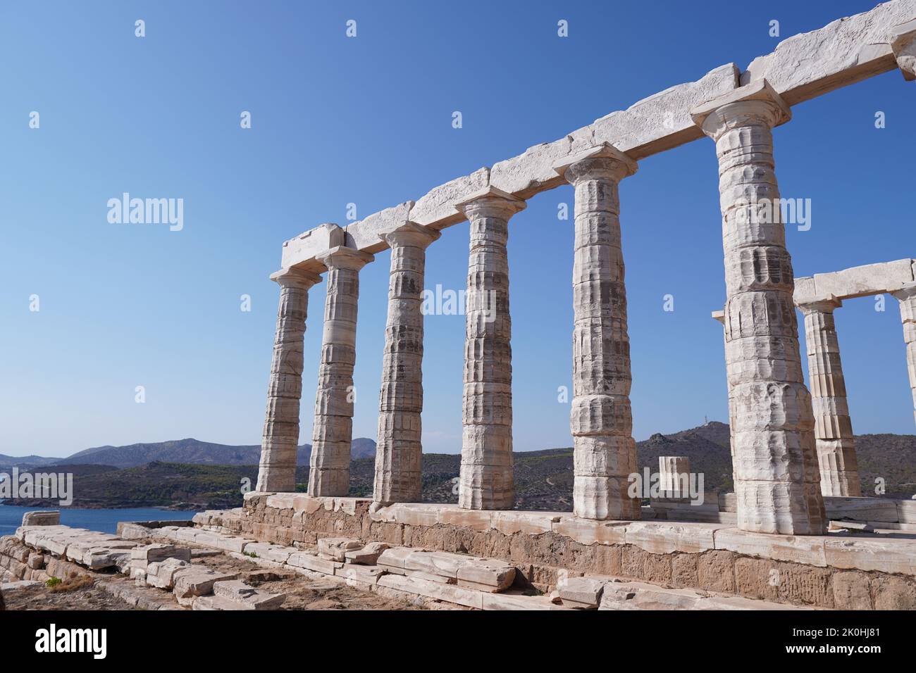 A low-angel view of a Greek temple ruins Stock Photo - Alamy