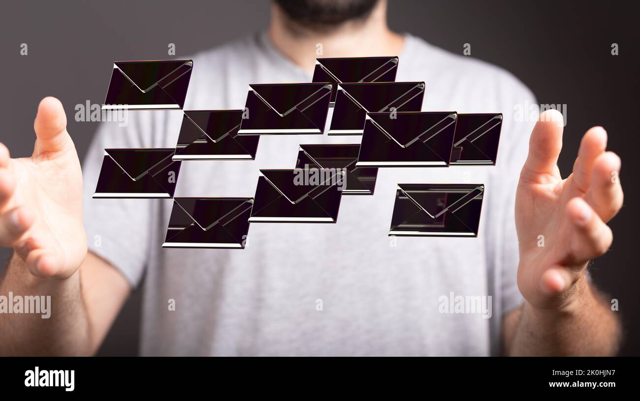 A group of illustrative email symbols floating in the palm of man Stock ...