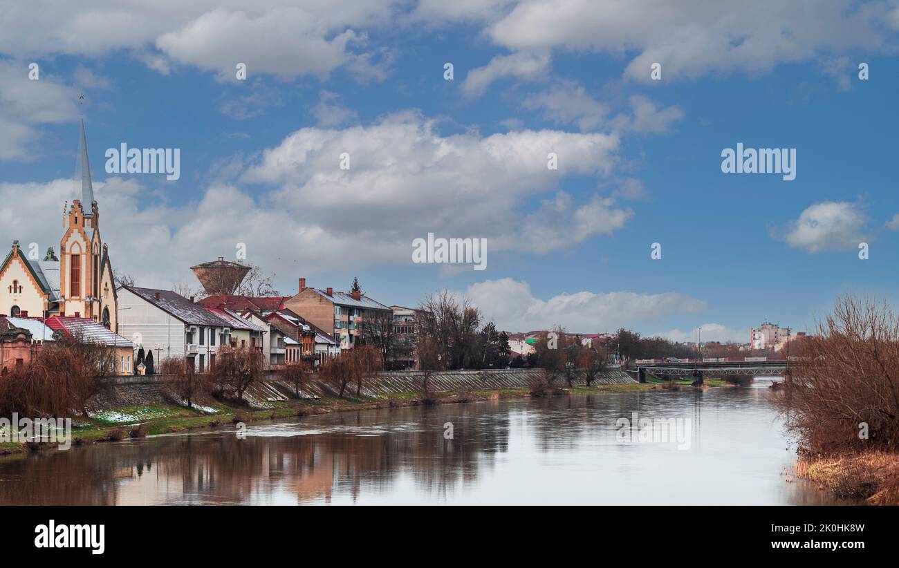 A cityscape with the river in the middle and a reflection of an old ...