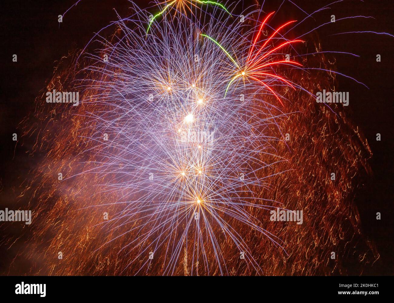 A Colorful glowing firework with long exposure Stock Photo - Alamy