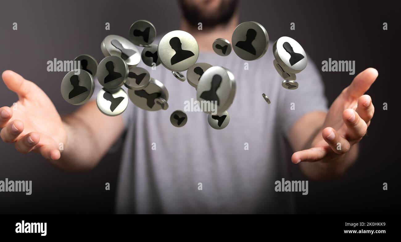 A man with his hands out toward floating 3D people icons - concept of ...