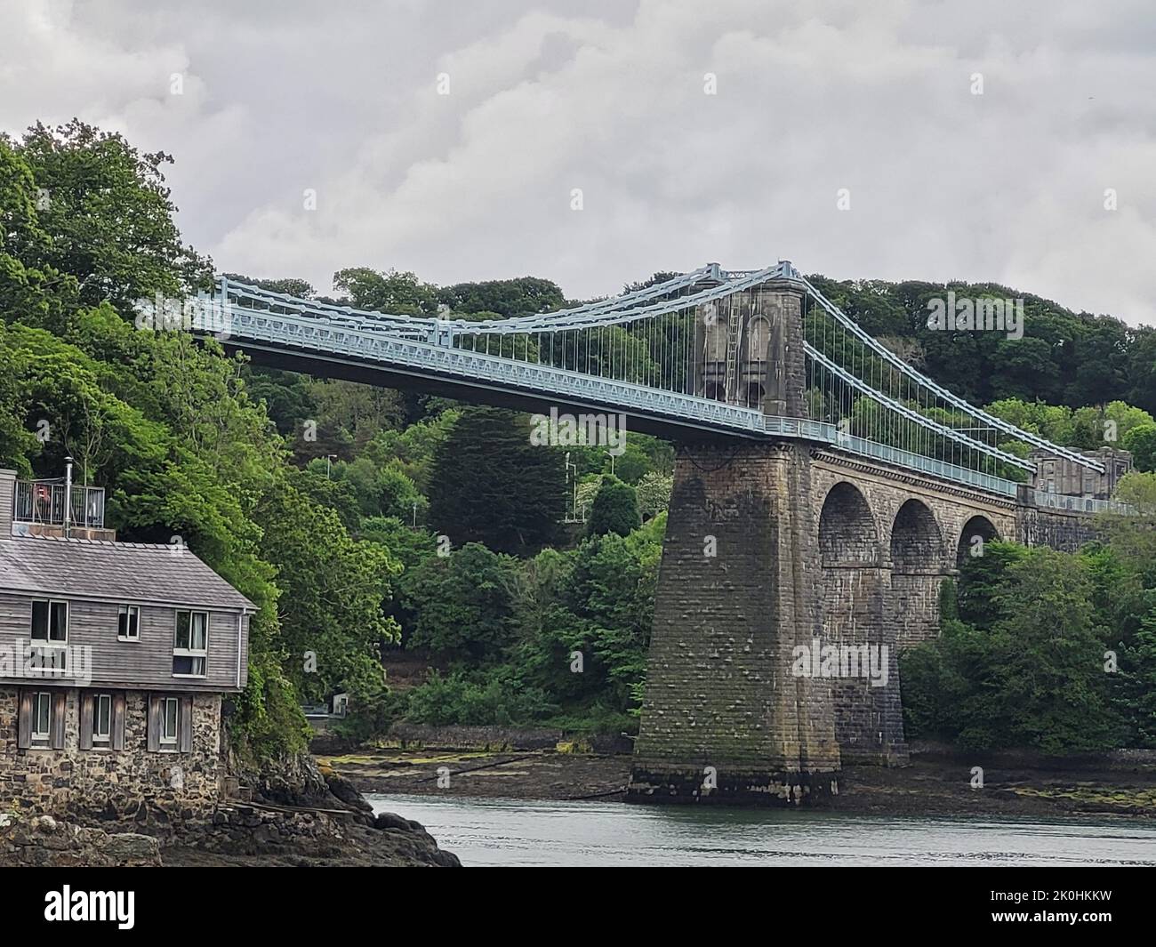 A beautiful view of the Menai Suspension Bridge in the United Kingdom ...