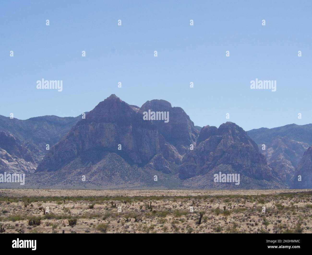 A beautiful view of a desert with rocks under the clear sky Stock Photo ...