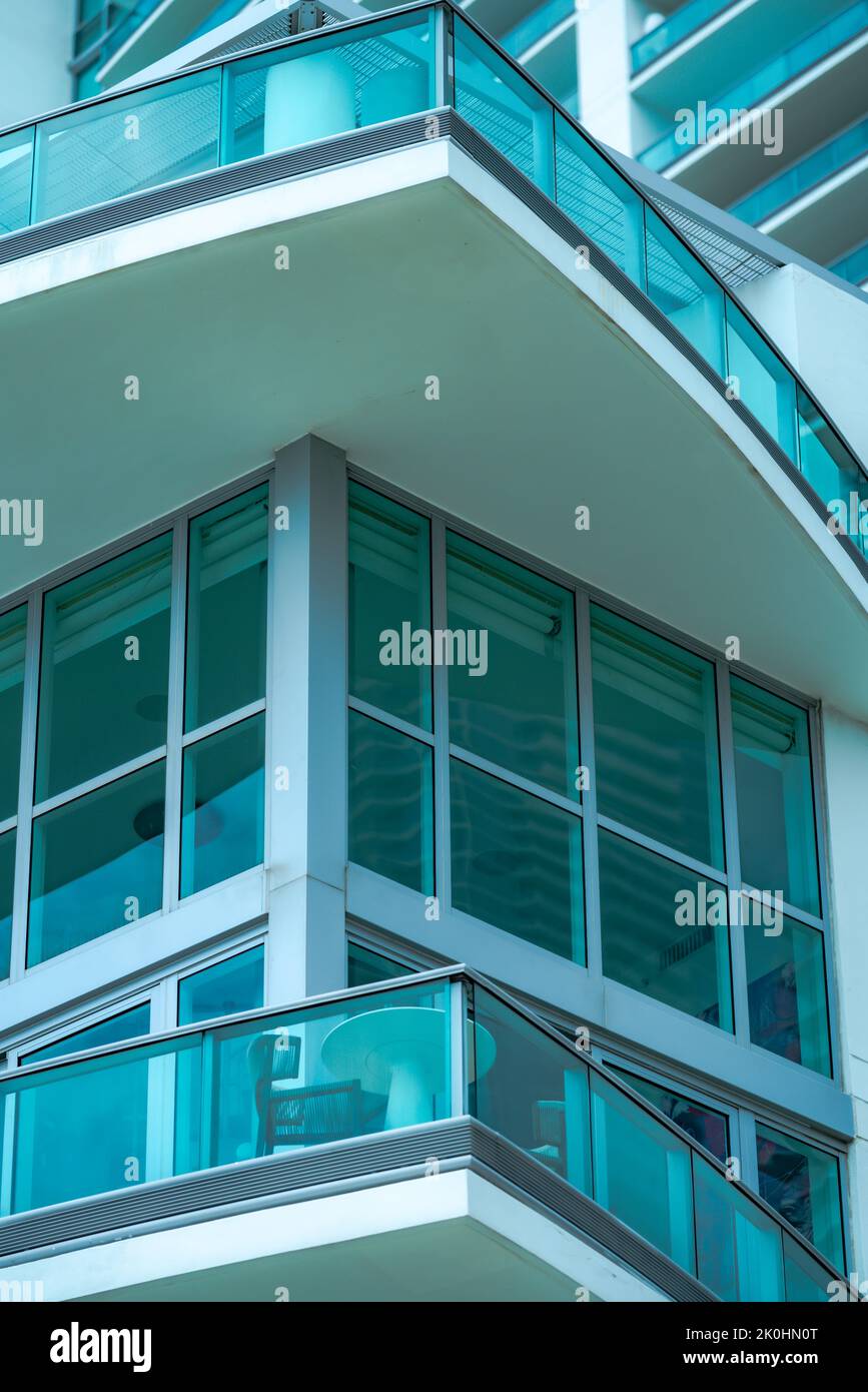 A modern residential glass-walled building, vertical shot Stock Photo ...