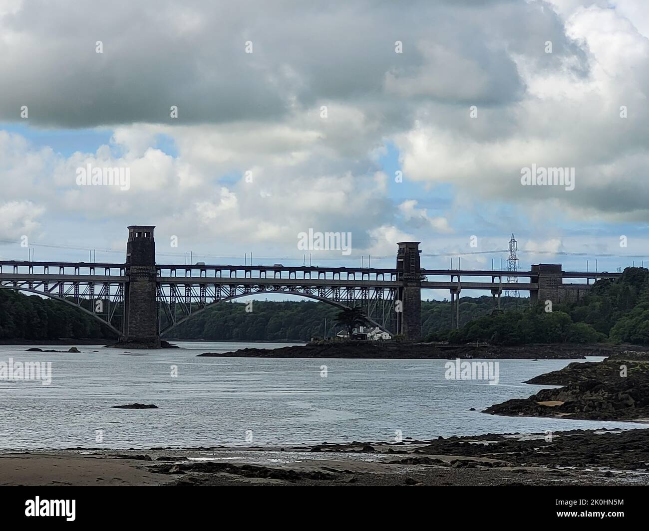 The Britannia Bridge under blue cloudy sky in Pentir, United Kingdom ...
