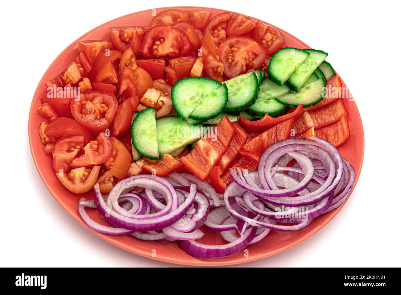 A plate full of fresh and healthy vegetables isolated on a white ...