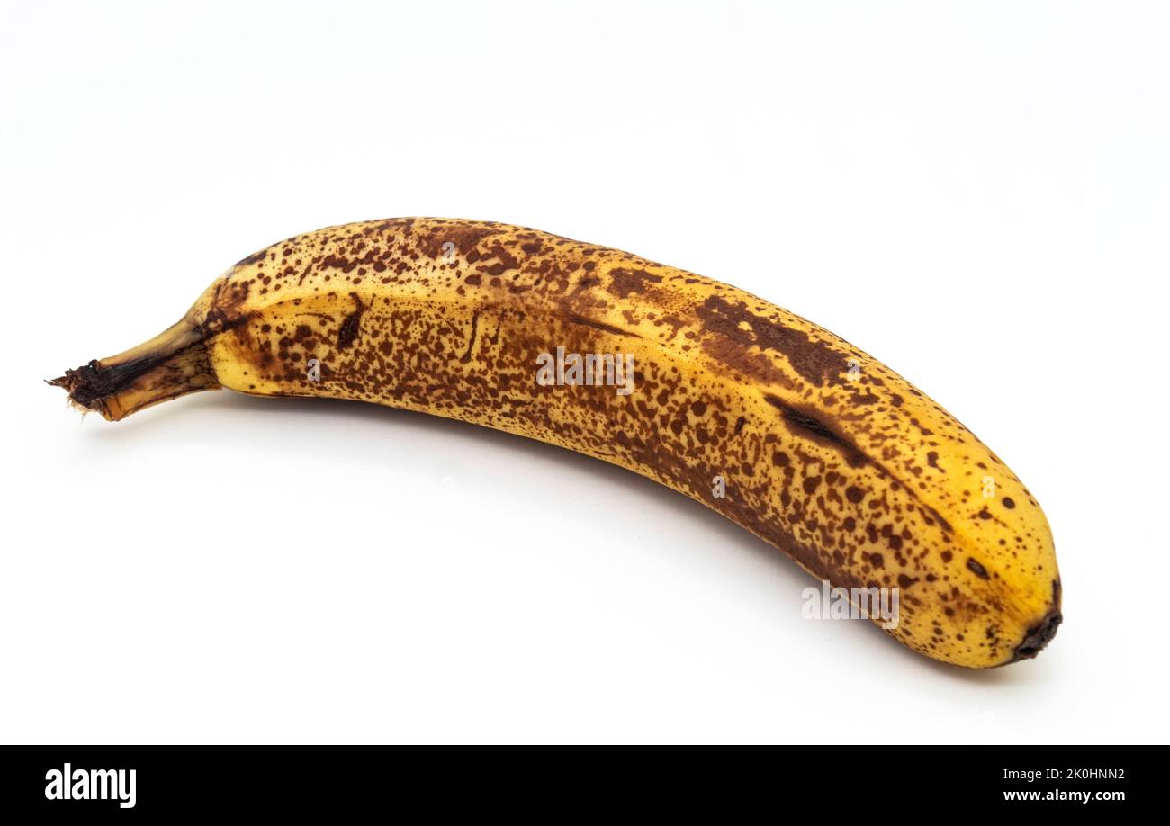 A single ripe banana isolated on a white background Stock Photo - Alamy