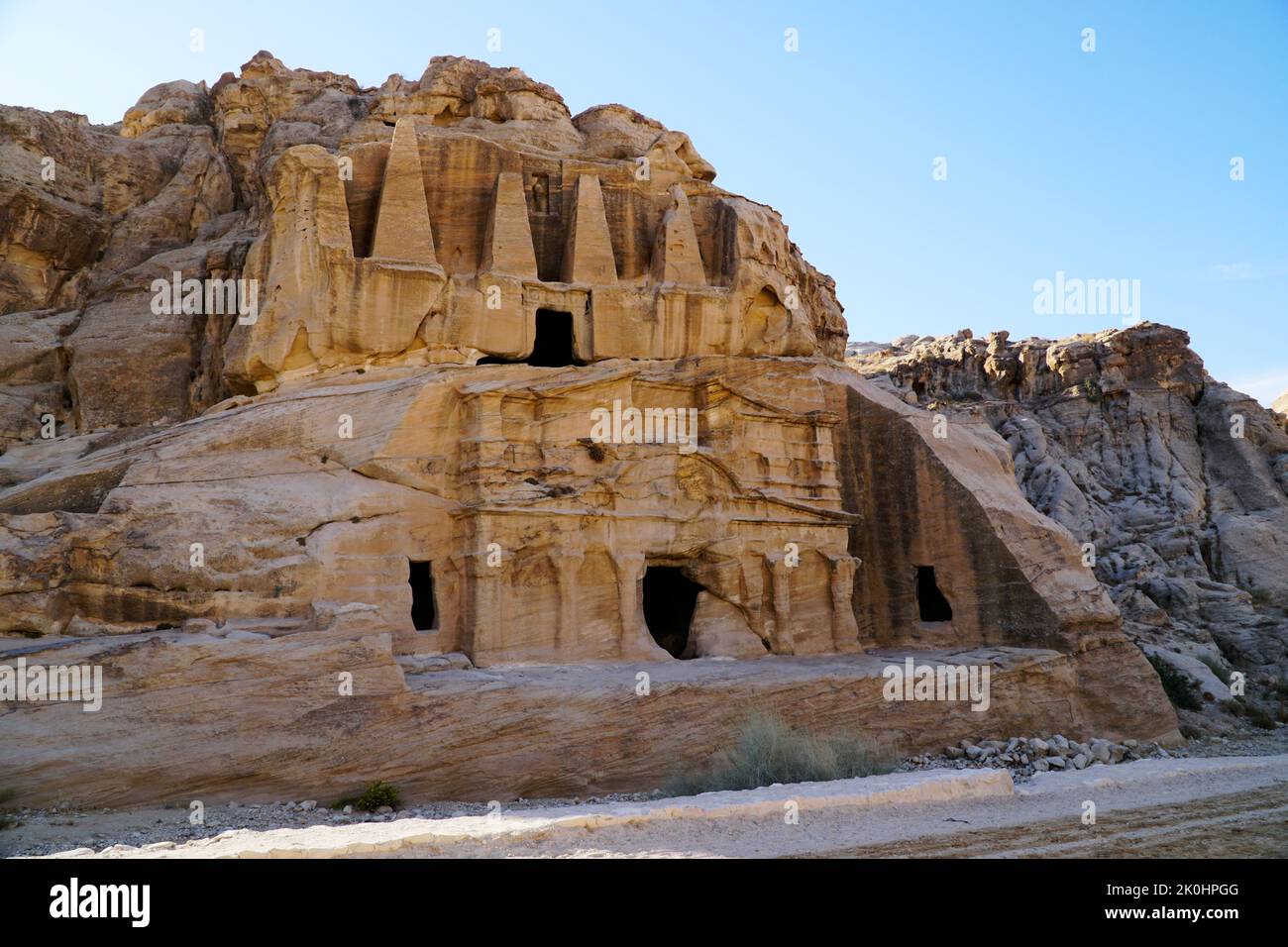 A stone temple ruin with a blue sky Stock Photo - Alamy