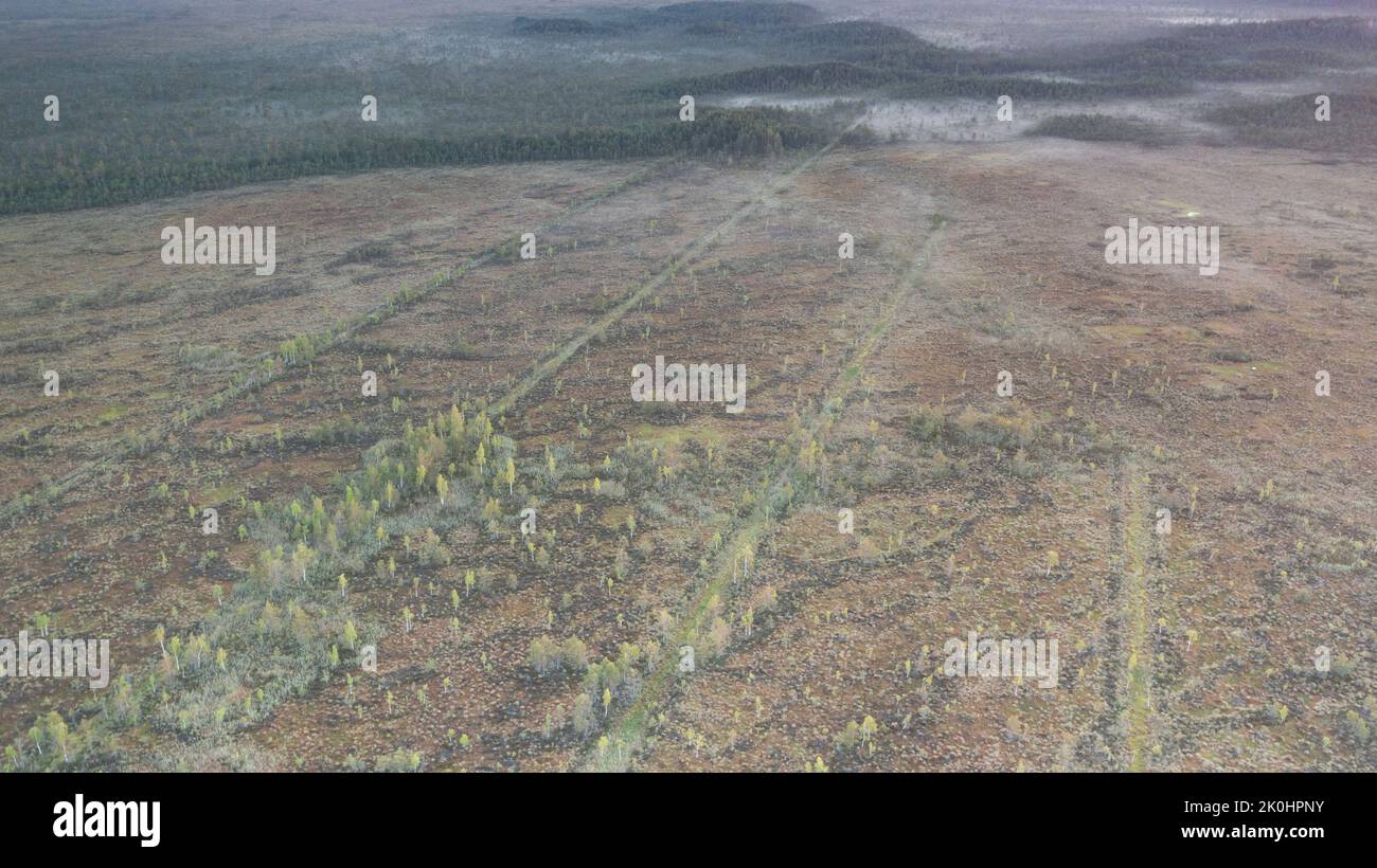 An aerial view of a wide dirt field Stock Photo - Alamy