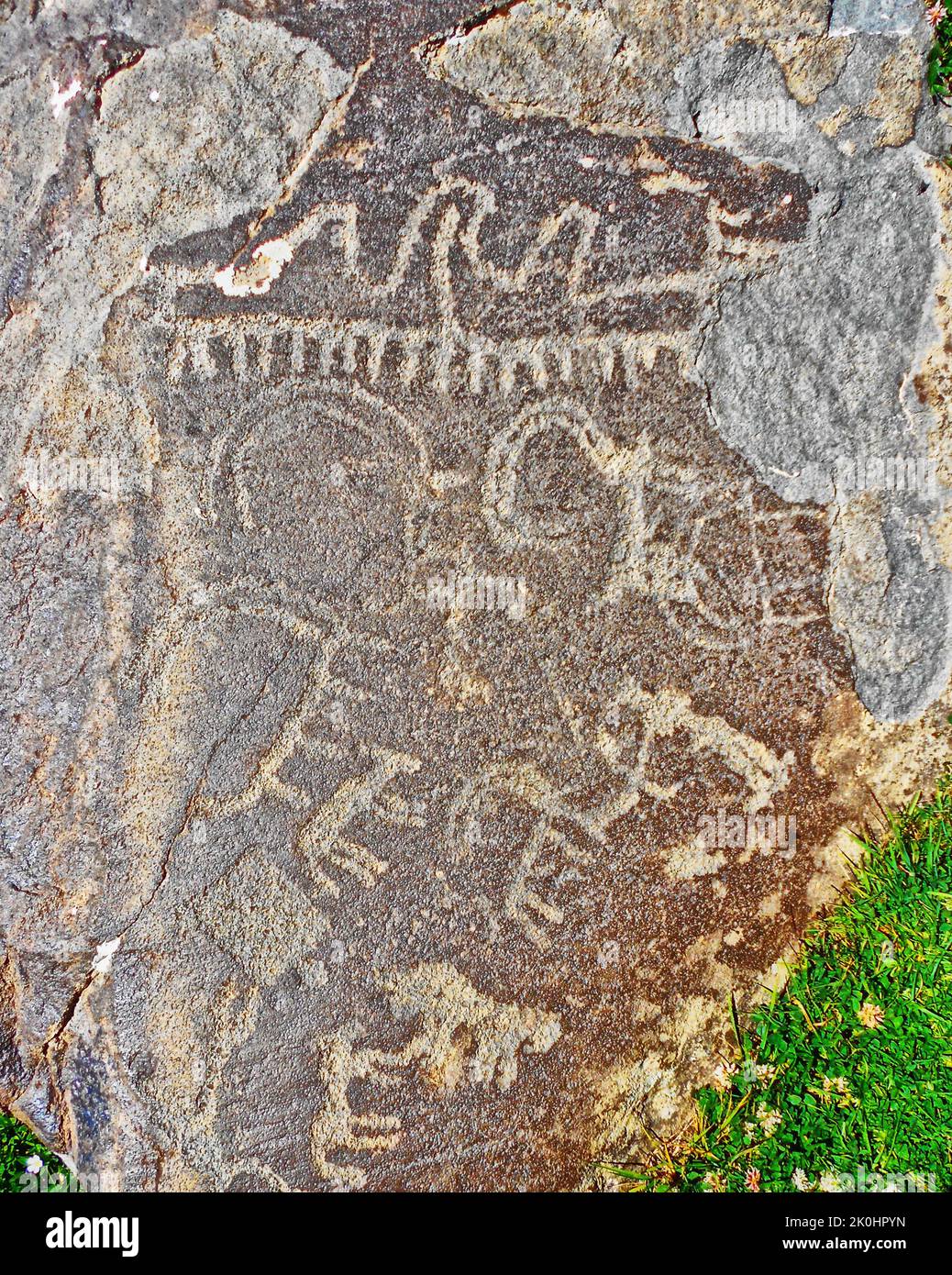 The ancient petroglyphs on mountain rocks in Ughtasar, Armenia Stock ...