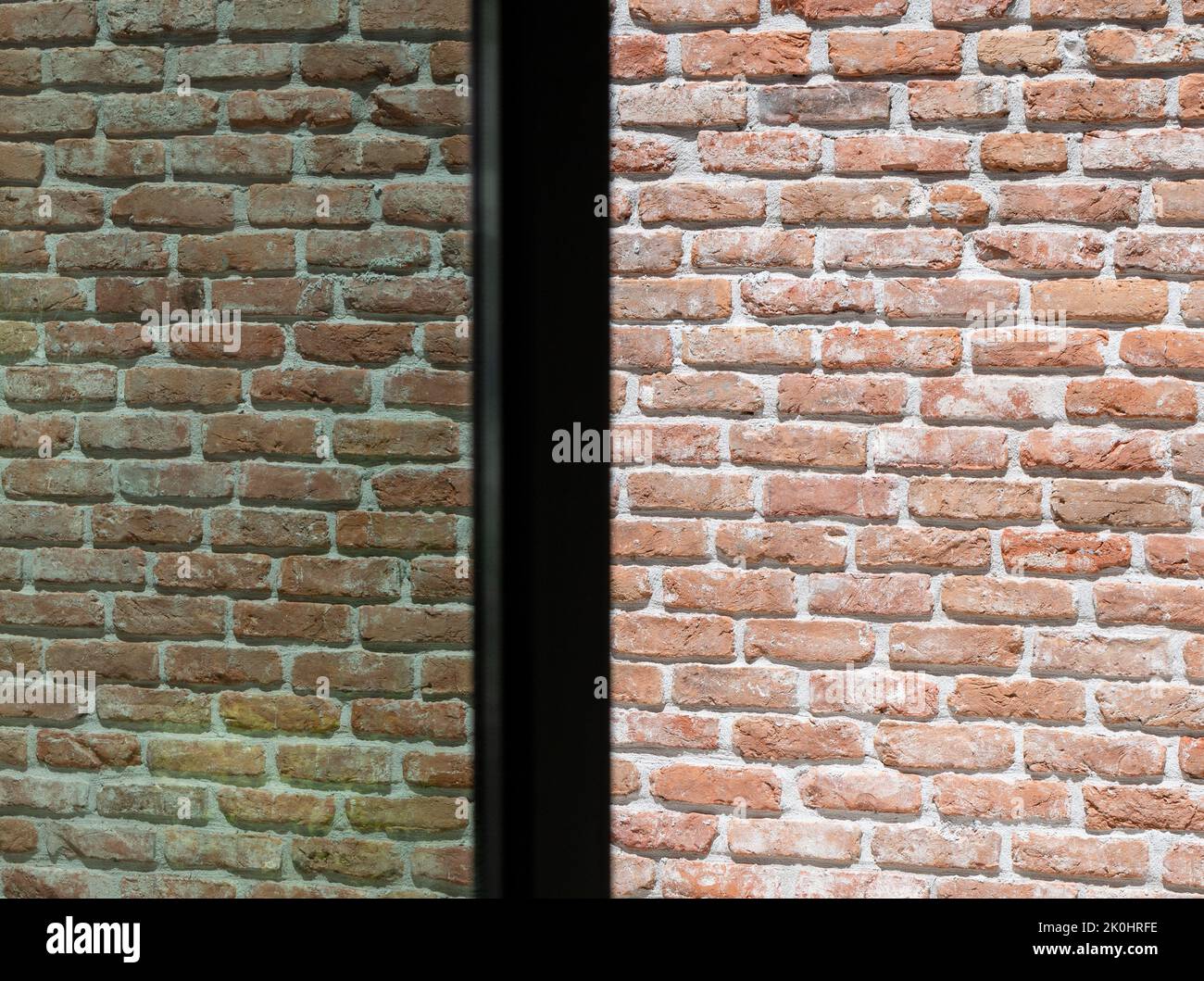 A window glass half open against a brick wall Stock Photo - Alamy