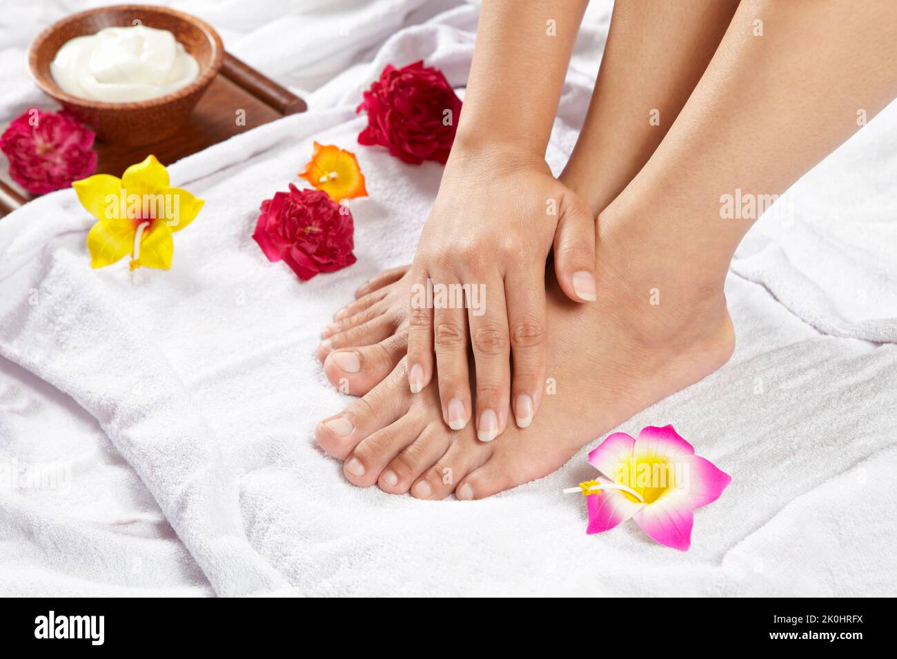 A hand on foot with healthy nails posing after a massage treatment ...