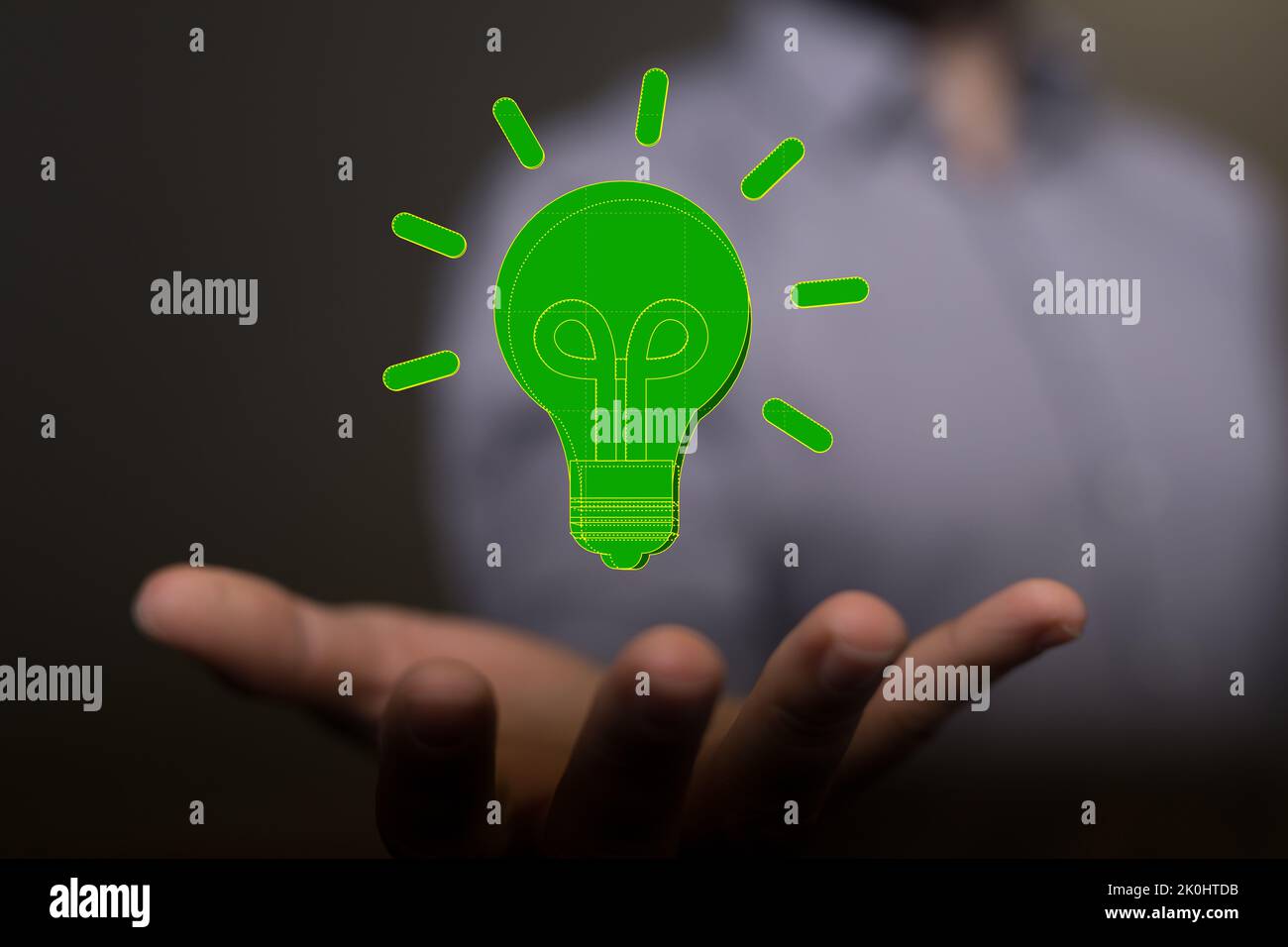 A man presenting the illustrated light bulb over his hand Stock Photo ...