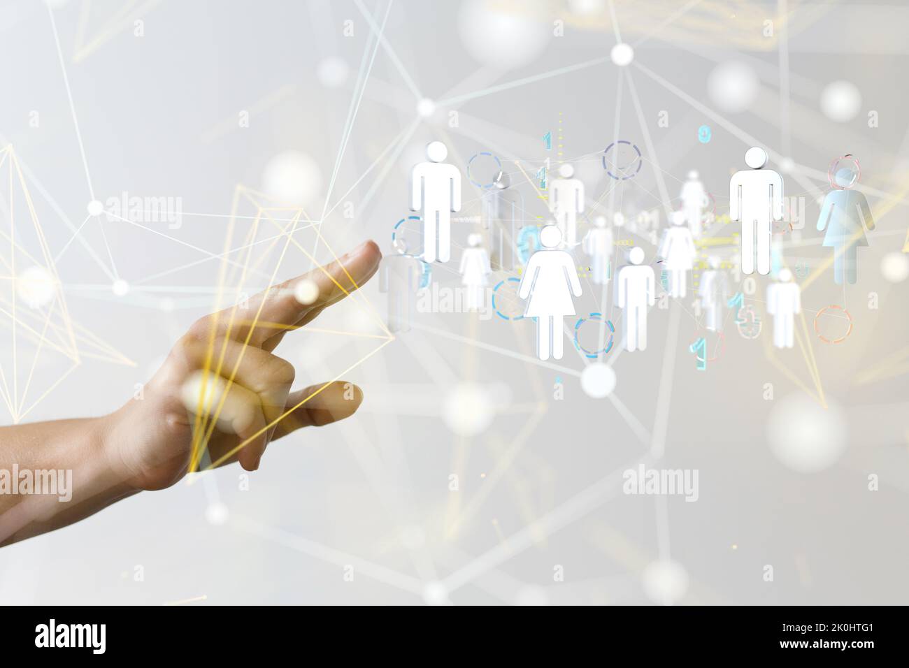 A man reaching for the illustrated people icons Stock Photo - Alamy