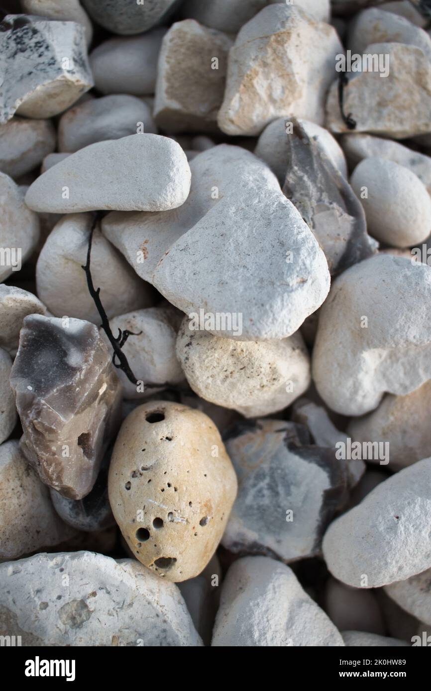 The vertical view of a stack of stones under the sunlight Stock Photo ...