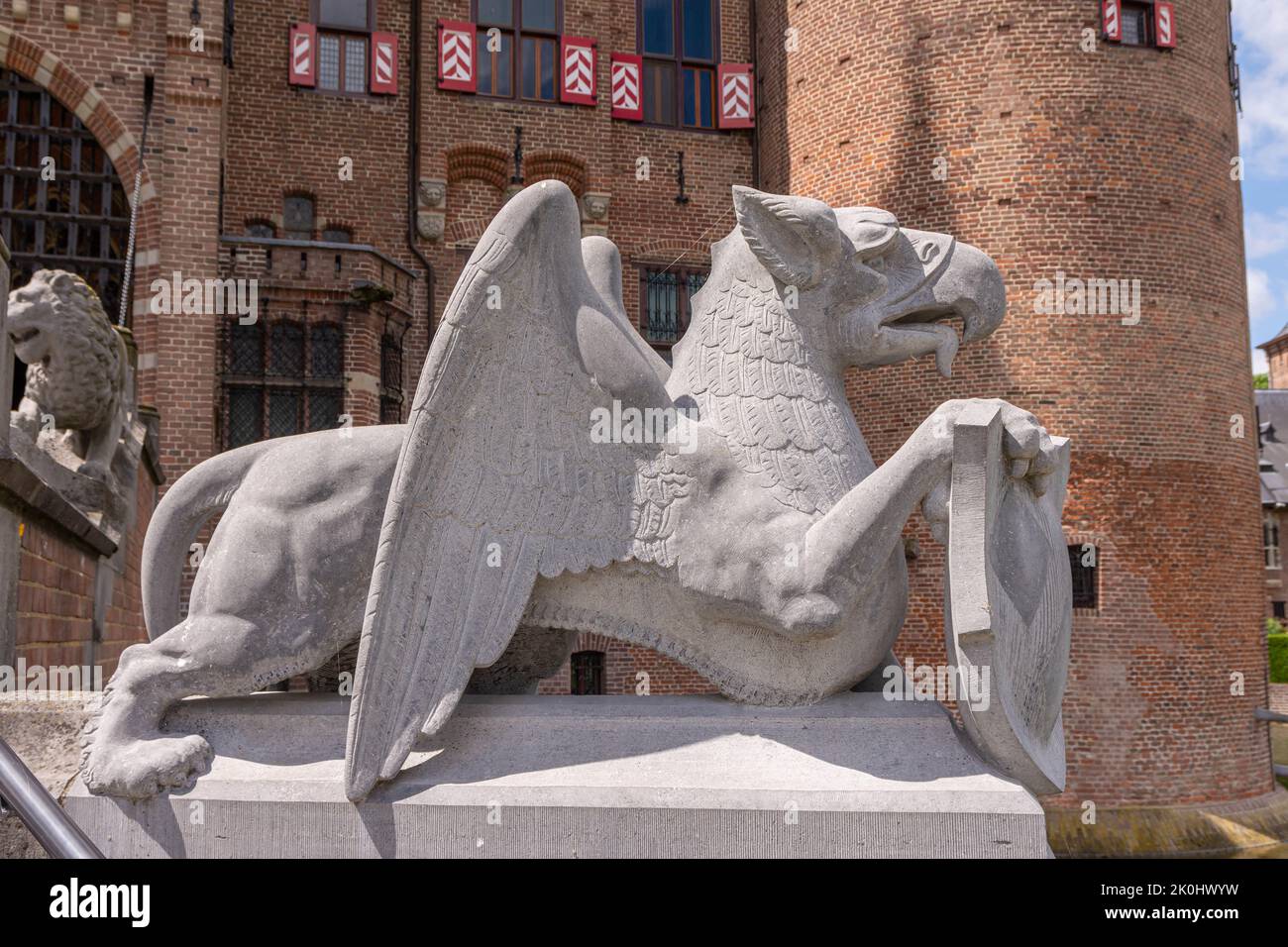 A mythical statue in front of a castle in closeup Stock Photo - Alamy