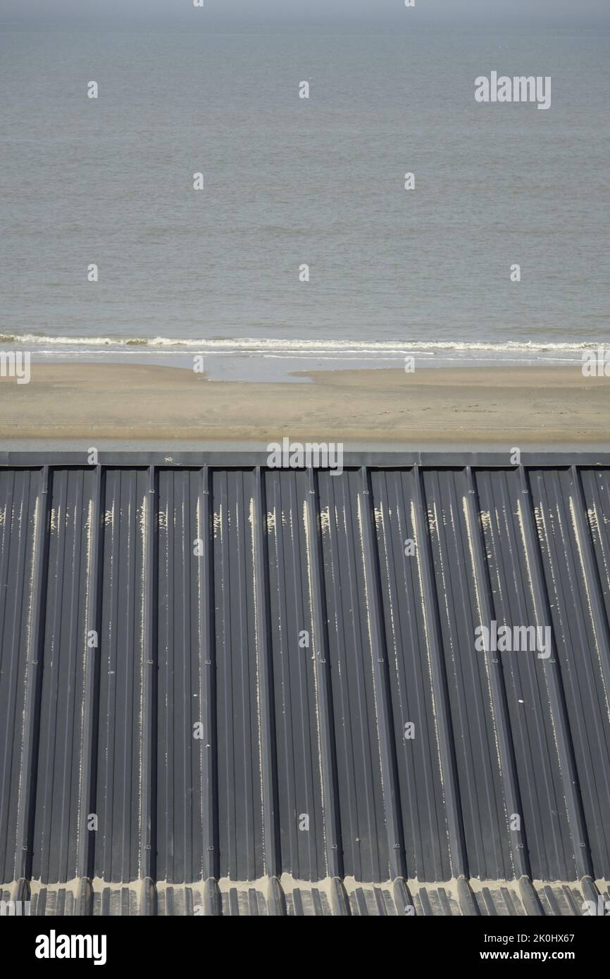 A vertical shot of the gray rooftop texture with the sea shore Stock ...