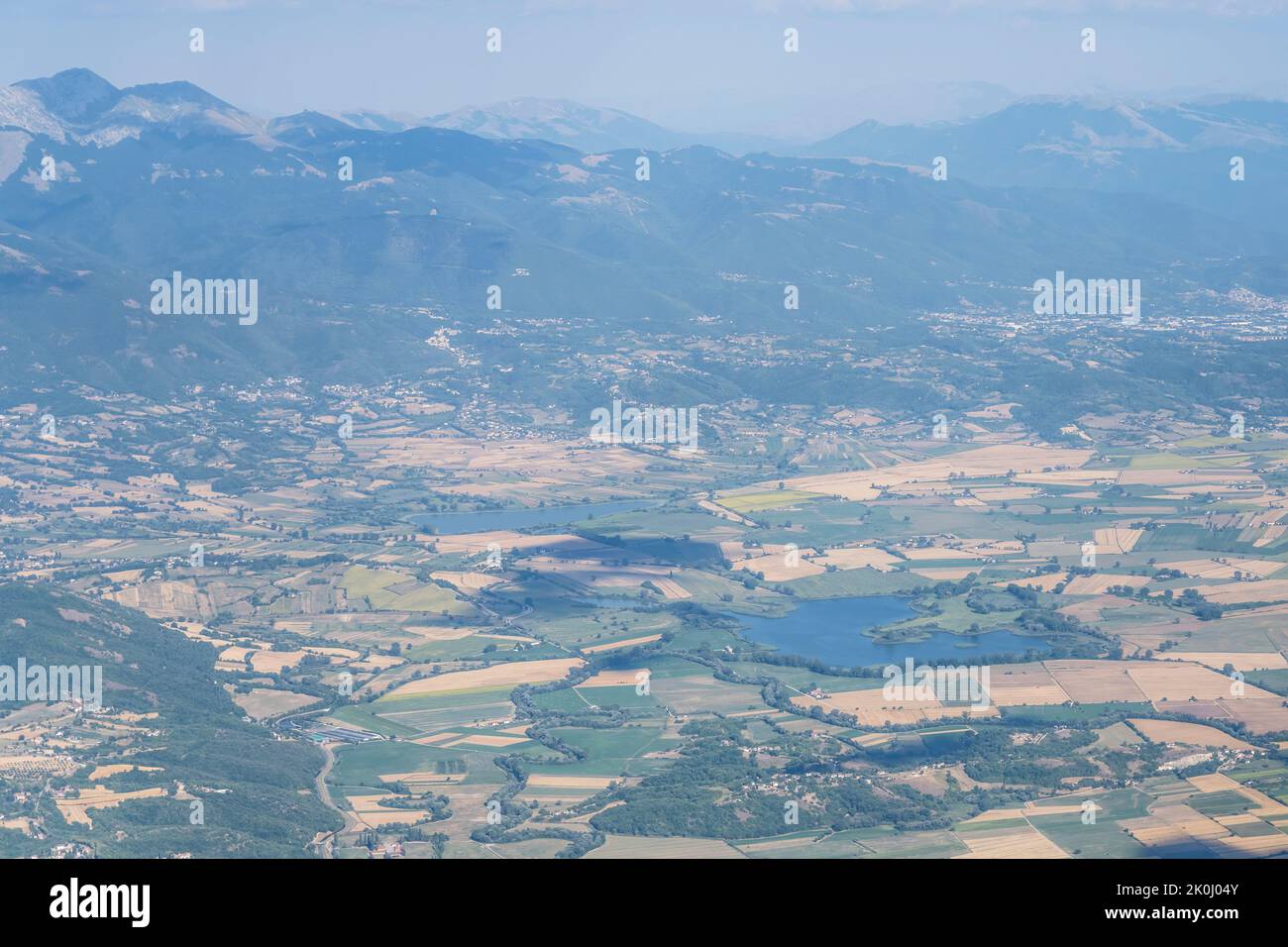 aerial shot, from a small plane, of Lungo and Ripa Sottile lakes in ...