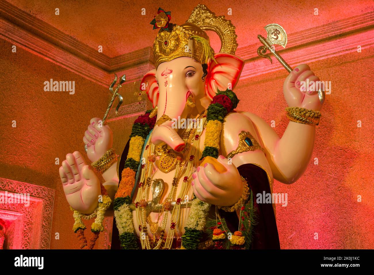 A statue of Lord Ganesha at a mandal in Mumbai for the auspicious ...