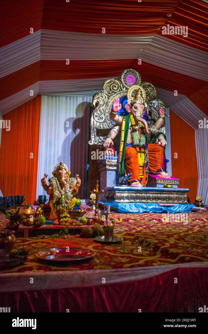 A statue of Lord Ganesha at a mandal in Mumbai for the auspicious ...