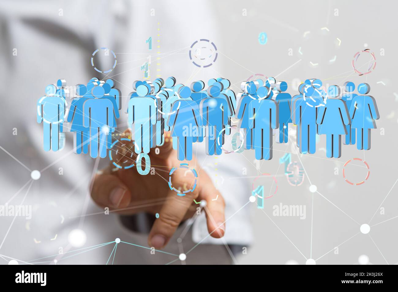 A man reaching for the illustrated people icons Stock Photo - Alamy