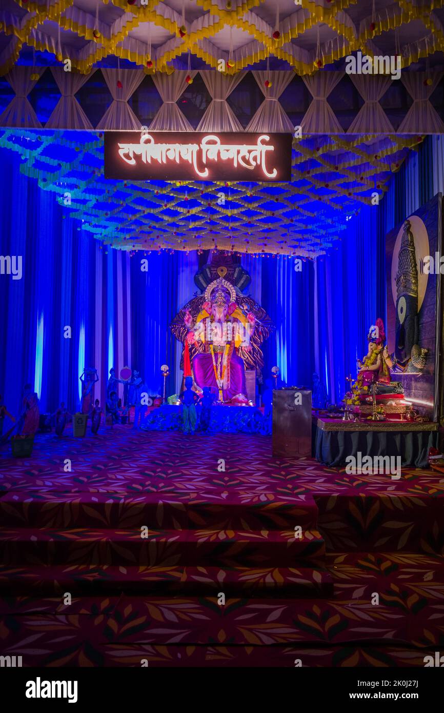 A statue of Lord Ganesha at a mandal in Mumbai for the auspicious ...