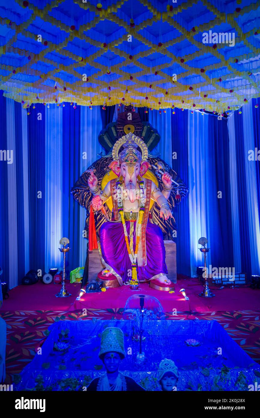 A statue of Lord Ganesha at a mandal in Mumbai for the auspicious ...