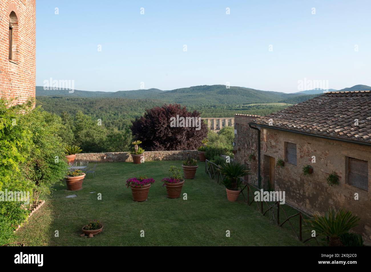 From the garden of the Eremo di Montesiepi, view of the valley with the ...